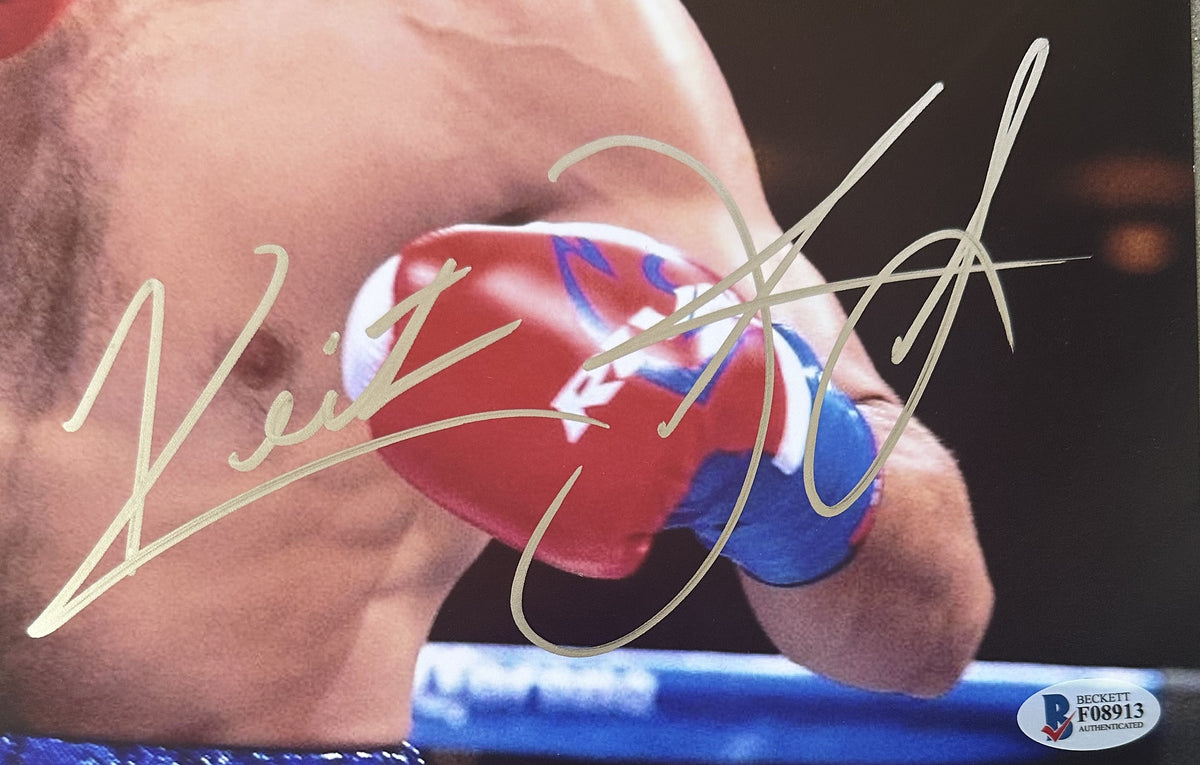 THURMAN, KEITH SIGNED LARGE FORMAT PHOTO (BECKETT) – JO Sports Inc.