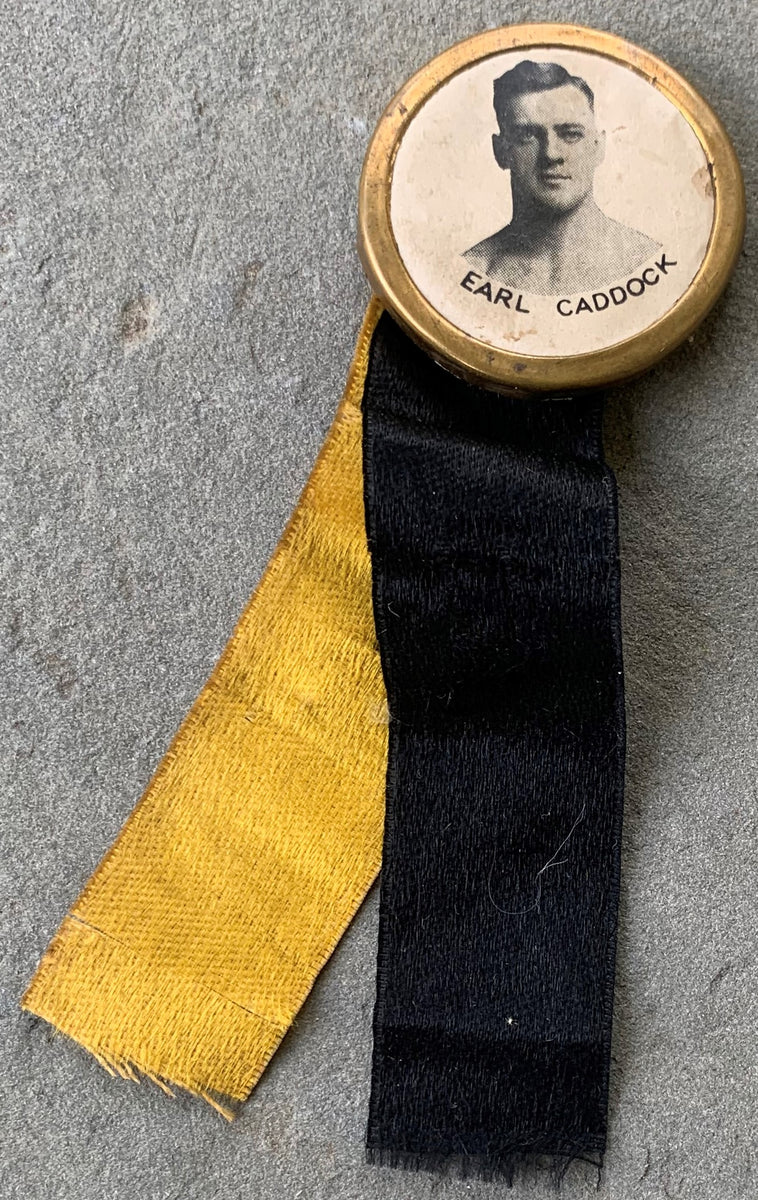 CADDOCK, EARL ORIGINAL SOUVENIR PIN – JO Sports Inc.