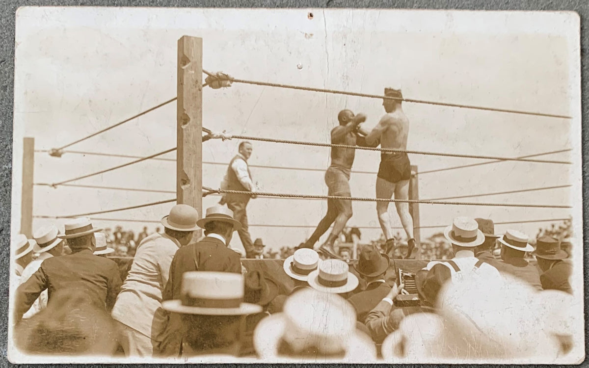 JOHNSON, JACK-JESS WILLARD REAL PHOTO POSTCARD (1915) – JO Sports Inc.