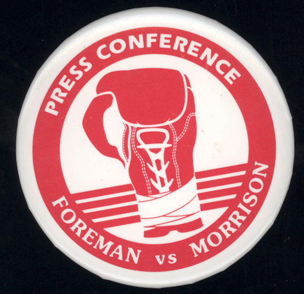 FOREMAN, GEORGE-TOMMY MORRISON PRESS CONFERENCE PIN (1993) – JO Sports Inc.