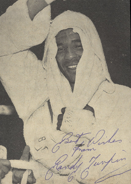 TURPIN, RANDY SIGNED NEWSPAPER PHOTO – JO Sports Inc.