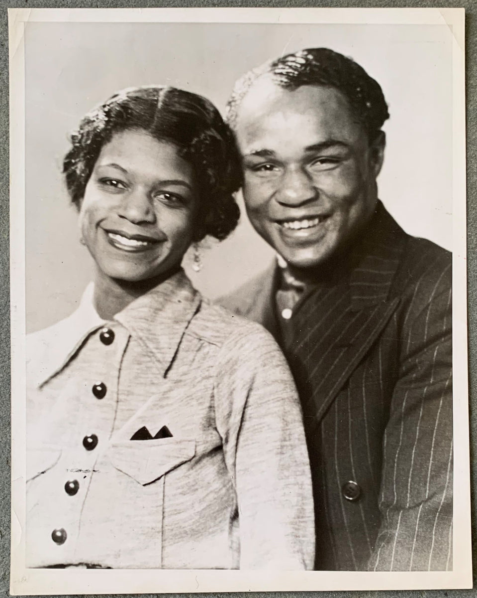 ARMSTRONG, HENRY & WIFE WIRE PHOTO – JO Sports Inc.