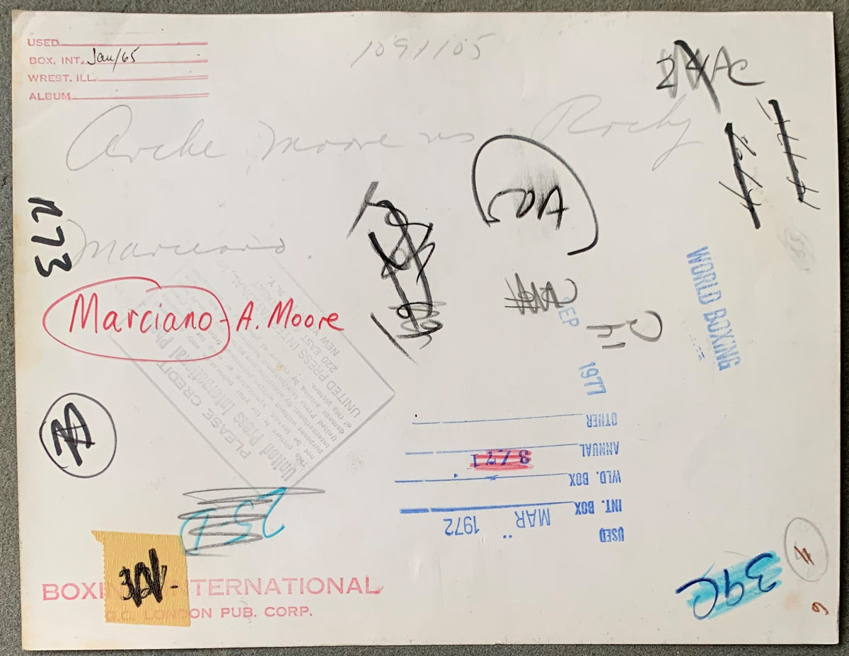 MARCIANO, ROCKY-ARCHIE MOORE ORIGINAL WIRE PHOTO (1955) – JO Sports Inc.