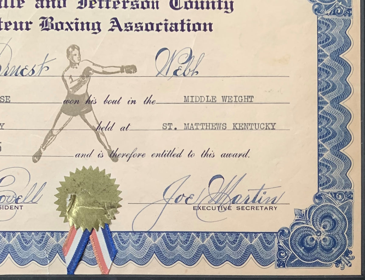 MARTIN, JOE SIGNED AMATEUR BOXING CERTIFICATE (CASSIUS CLAY FIRST TRAI ...
