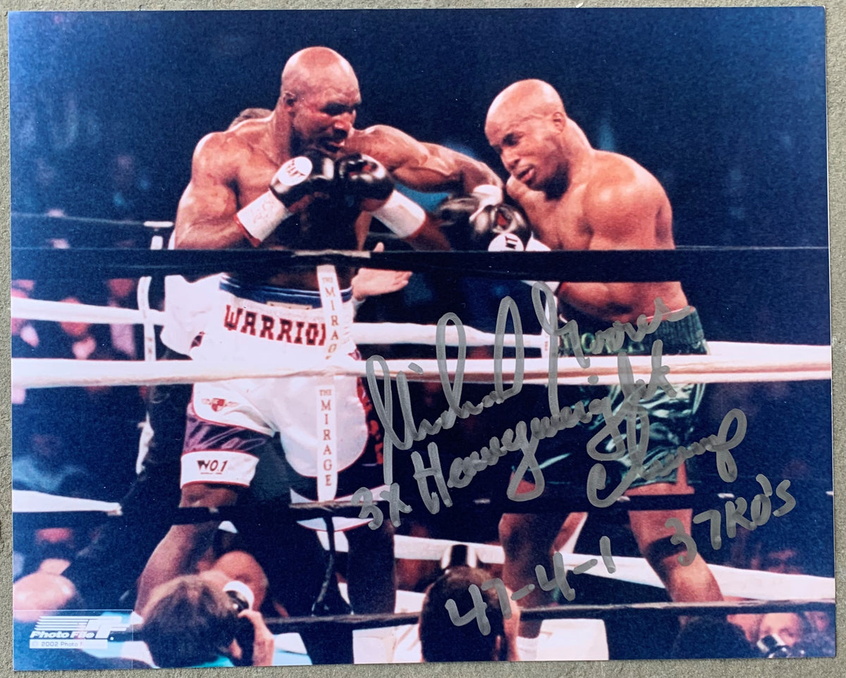 MOORER, MICHAEL SIGNED ACTION PHOTO (HOLYFIELD FIGHT) – JO Sports Inc.